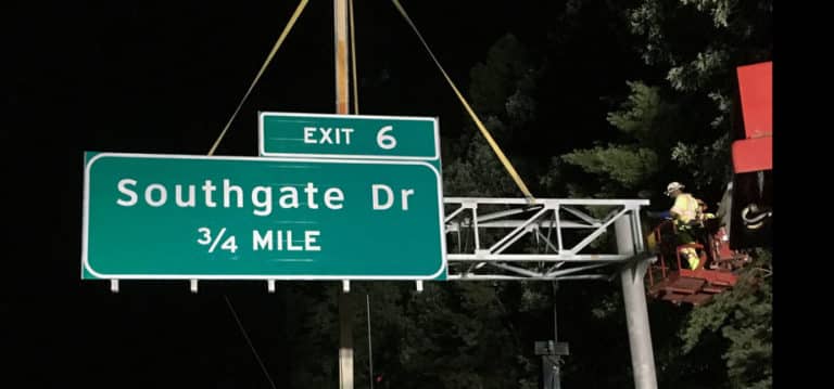 Overhead Signage | Underbridge and Aerial Access Equipment Rentals ...